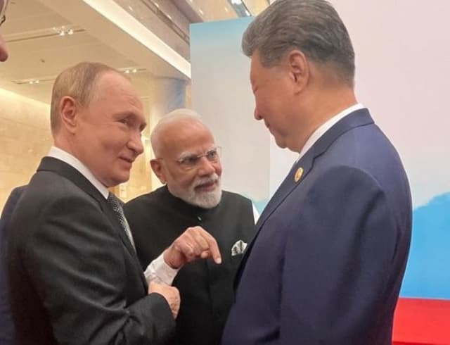 Putin meets Modi, Xi at China's SCO summit, again blames NATO ...